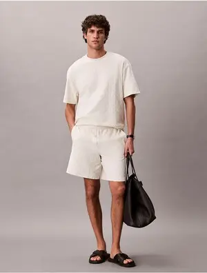 Calvin Klein Terry Allover Embossed Emblem Logo Relaxed T-shirt - Tofu
