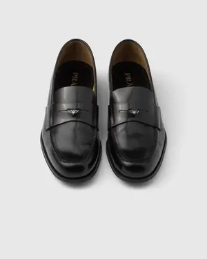 Prada Brushed Leather Loafers With Enameled Metal Triangle Logo