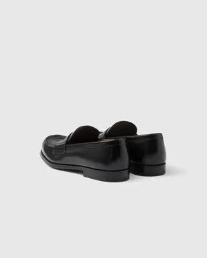 Prada Brushed Leather Loafers With Enameled Metal Triangle Logo