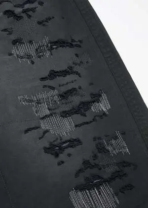 Acne Studios Mended Distressed Wide Leg Trousers