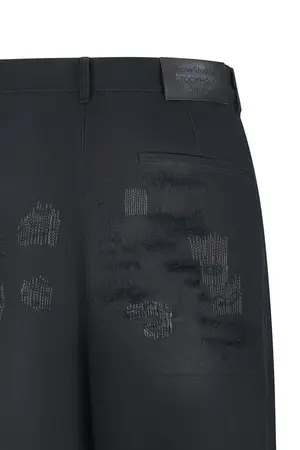 Acne Studios Mended Distressed Wide Leg Trousers