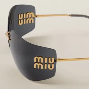 Miu Miu Rimless Curved Lens Sunglasses - Black