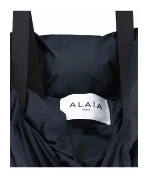 Alaïa Padded Down Jacket With High Neck