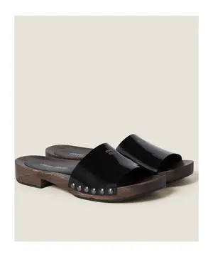 Miu Miu Patent Leather Clogs With Embossed Logo