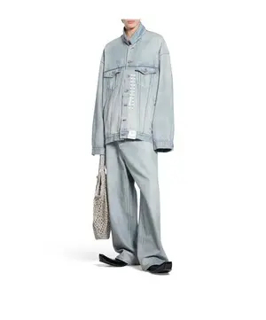Balenciaga Distressed Denim Jacket With Carved Elastic Buttons - Light Blue