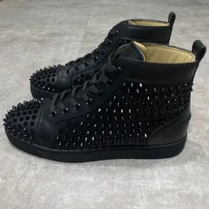 CHRISTIAN LOUBOUTIN Louis All-over Studded Sneakers