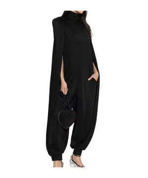 Alaïa Draped Turtleneck Jumpsuit With Cape Effect