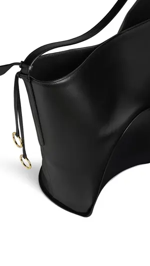 Alaïa Leather Bucket Bag With Metal Charms
