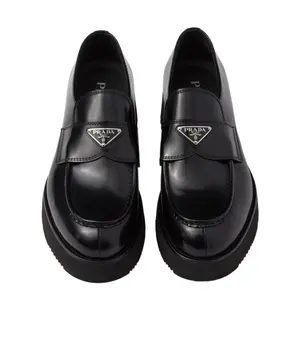 Prada Brushed Leather Loafers With Enameled Metal Logo