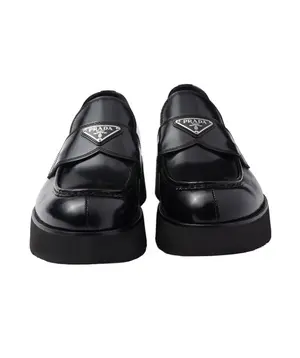 Prada Brushed Leather Loafers With Enameled Metal Logo