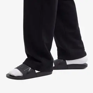 Valentino Garavani Vltn Logo Embossed Slip-on Slides