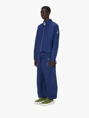 J.W.ANDERSON Jw Anderson Anchor Logo Printed Twisted Joggers