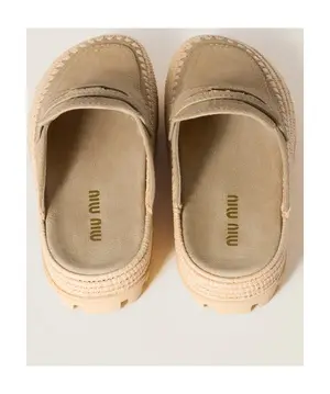 Miu Miu Embossed Logo Slip-on Mules - Beige