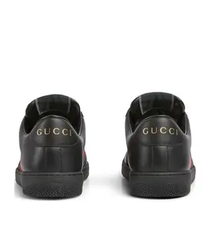 Gucci Embossed Gg Leather Low-top Sneakers