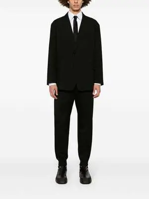Alexander McQueen Mid-rise Tapered-leg Trousers With Buckled Detail