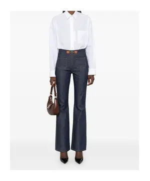 Celine Flared Jeans With Horn Detail