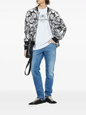 Dolce & Gabbana Slim Fit Jeans With Logo Plaque