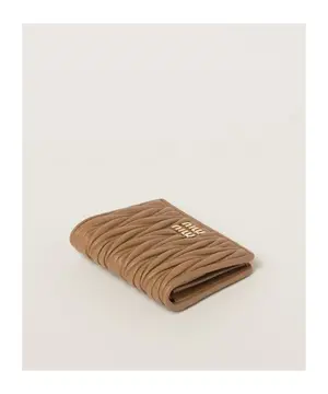 Miu Miu Logo-lettering Matelassé Bi-fold Wallet - Brown