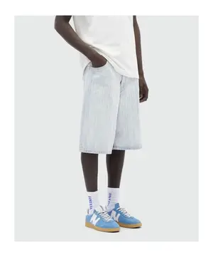 MSGM Logo Patch Distressed Denim Bermuda Shorts - Light-colored