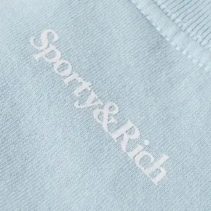 SPORTY  RICH Sporty & Rich Long Sleeve Crewneck Sweater