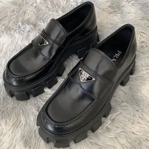 Prada Monolith Brushed Leather Loafers - Black
