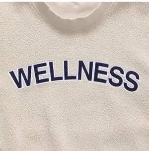 SPORTY  RICH Sporty & Rich Sherpa Wellness Crewneck Sweatshirt