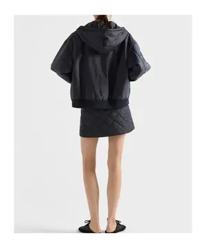 Prada Quilted Mini Skirt With Logo Detail