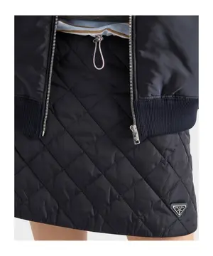 Prada Quilted Mini Skirt With Logo Detail