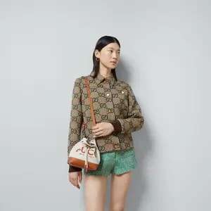 Gucci Logo Print Leather Trimmed Bucket Bag