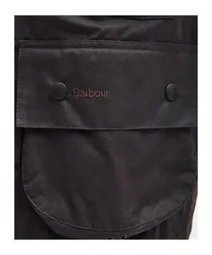 Barbour Waxed Jacket With Plaid Lining And Corduroy Collar