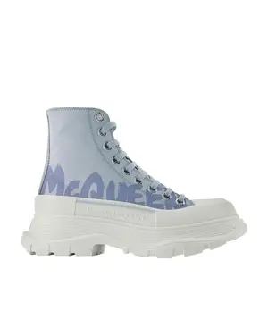 Alexander McQueen Tread Slick High-top Sneakers With Logo Print - Blue