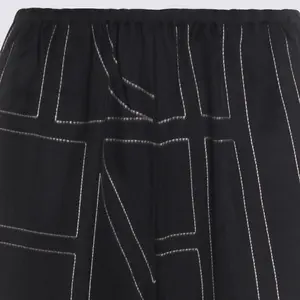 TOTEME Monogram Patterned Wide-leg Silk Pajama Pants - Black