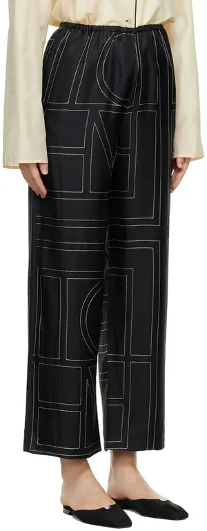 TOTEME Monogram Patterned Wide-leg Silk Pajama Pants - Black