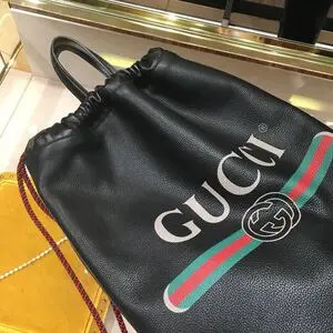 Gucci Logo Drawstring Backpack