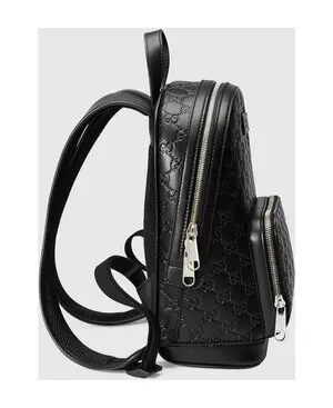 Gucci Signature Embossed Leather Backpack