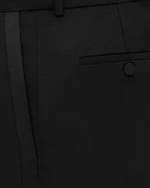 Saint Laurent Wool High-waisted Carrot Leg Pleated Pants With Ribbon Detail