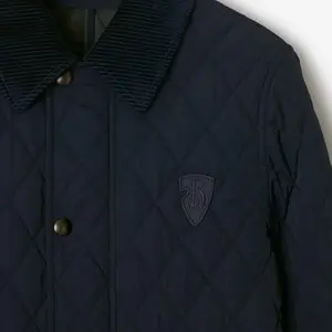 Burberry Quilted Jacket With Plaid Lining And Shield Emblem