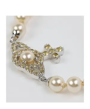 VIVIENNE WESTWOOD Saturn Motif Pearl Bracelet