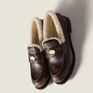 Miu Miu Bleached Leather And Shearling Loafers - Ebony