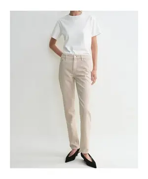 TOTEME Low-rise Tapered Jeans