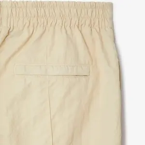 Burberry Crinkled Elasticated Waistband Wide-leg Track Pants - Soap Color