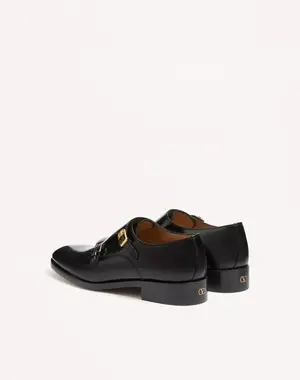 Valentino Garavani Buckled Slip-on Loafers