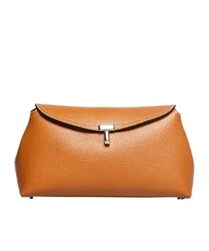 TOTEME Logo Plaque Foldover Top Crossbody Bag - Orange