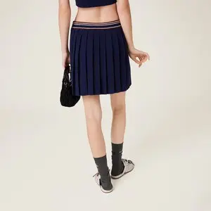 Miu Miu Pleated Mini Skirt With Logo Patch