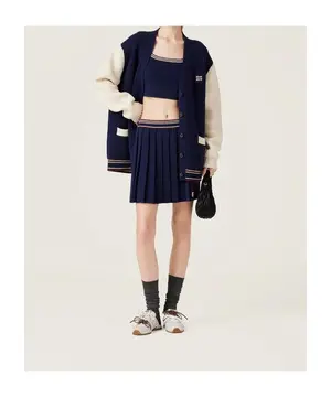 Miu Miu Pleated Mini Skirt With Logo Patch