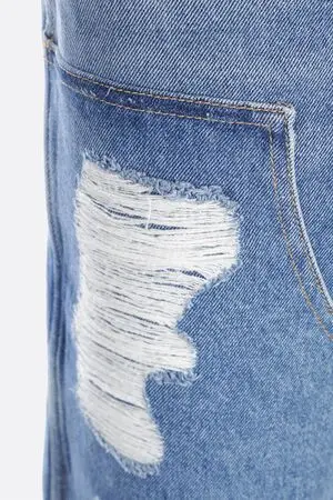 Givenchy Destroyed Denim Oversized Jeans - Light Blue