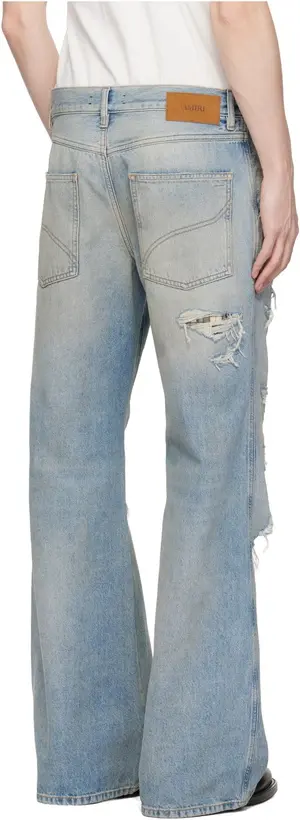 Amiri Distressed Bootcut Jeans - Agedindigo