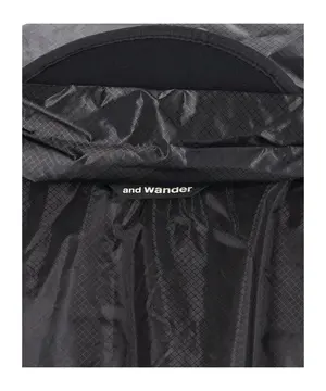 AND WANDER Drawstring Hooded Raincoat