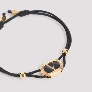 Valentino Garavani Gold Tone Logo Bracelet