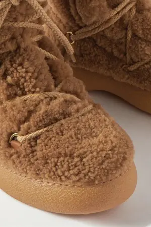 TOD'S Round Toe Boots With Tie Fastening